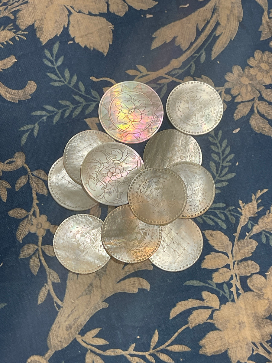 A Collection of 11 Round Engraved Pearl Gaming Counters – Monahan Papers